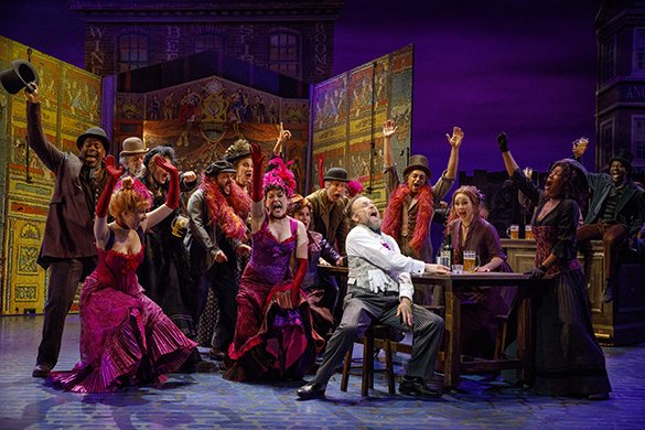 Norbert Leo Butz and the company. Photo by Joan Marcus.